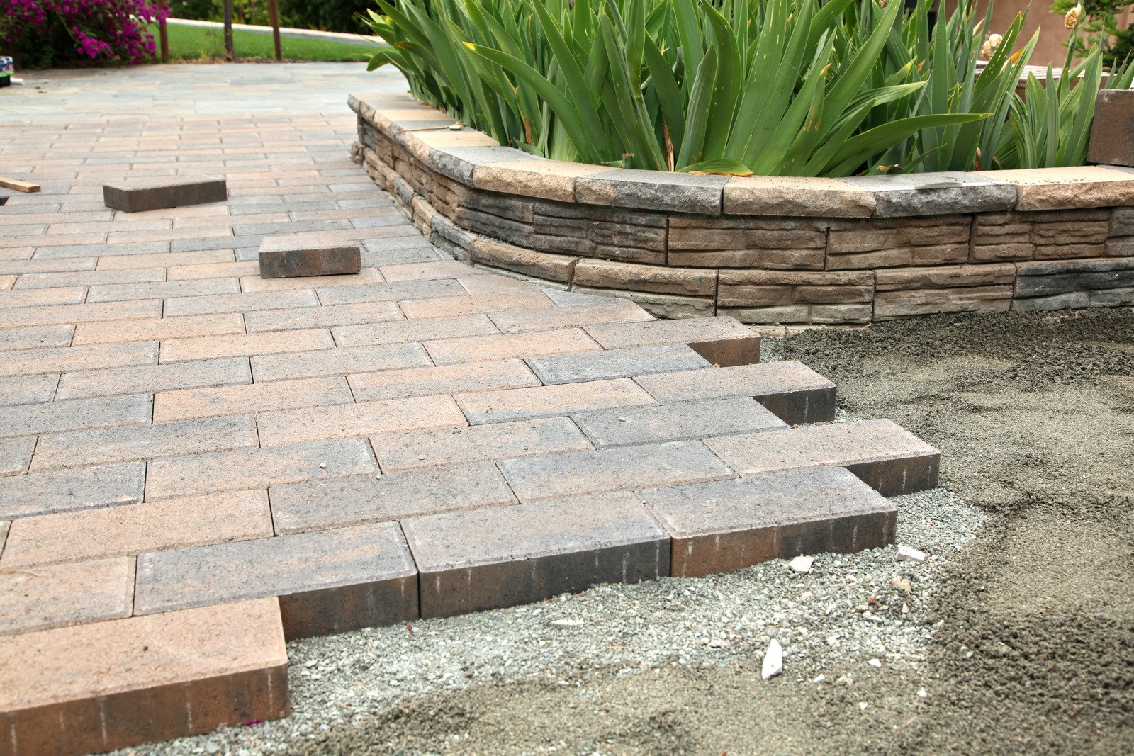 How a Walkway Installer Can Enhance Your Property with Retaining Walls ...